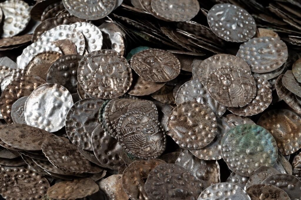 Massive medieval silver hoard of up to 20,000 coins and jewelry ...