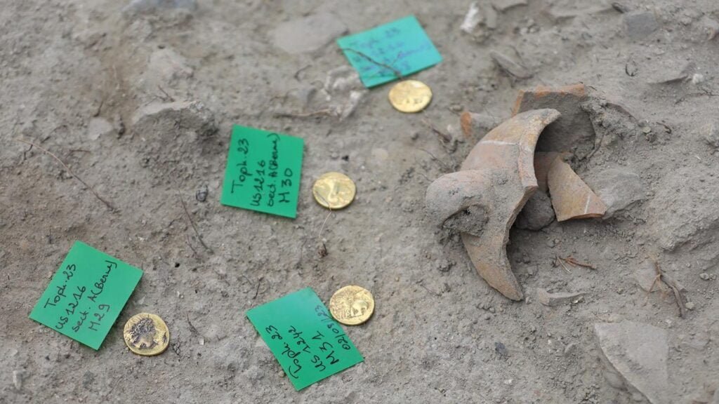 Five 2,300-year-old gold coins and cremated infants discovered in ...