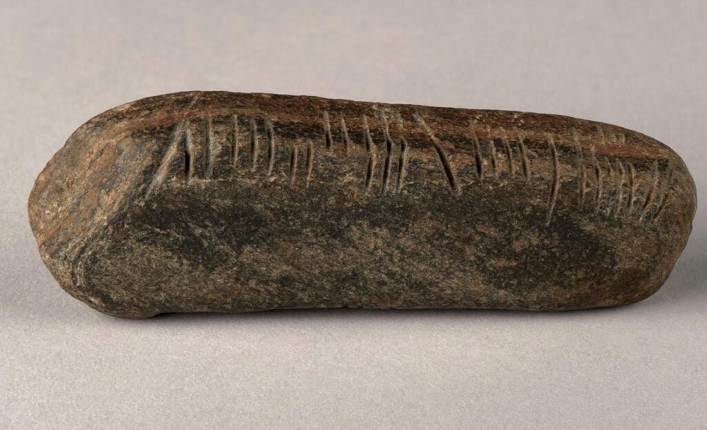 Teacher finds stone with 1,600-year-old writing in Ireland ...